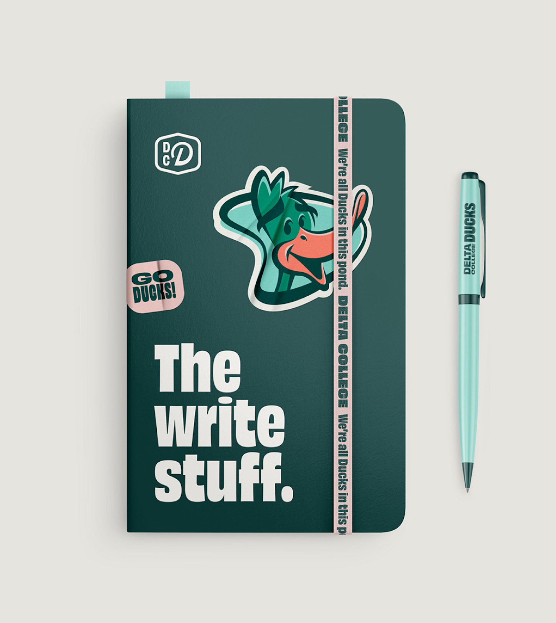 Custom branded notebooks and pens by Delta College