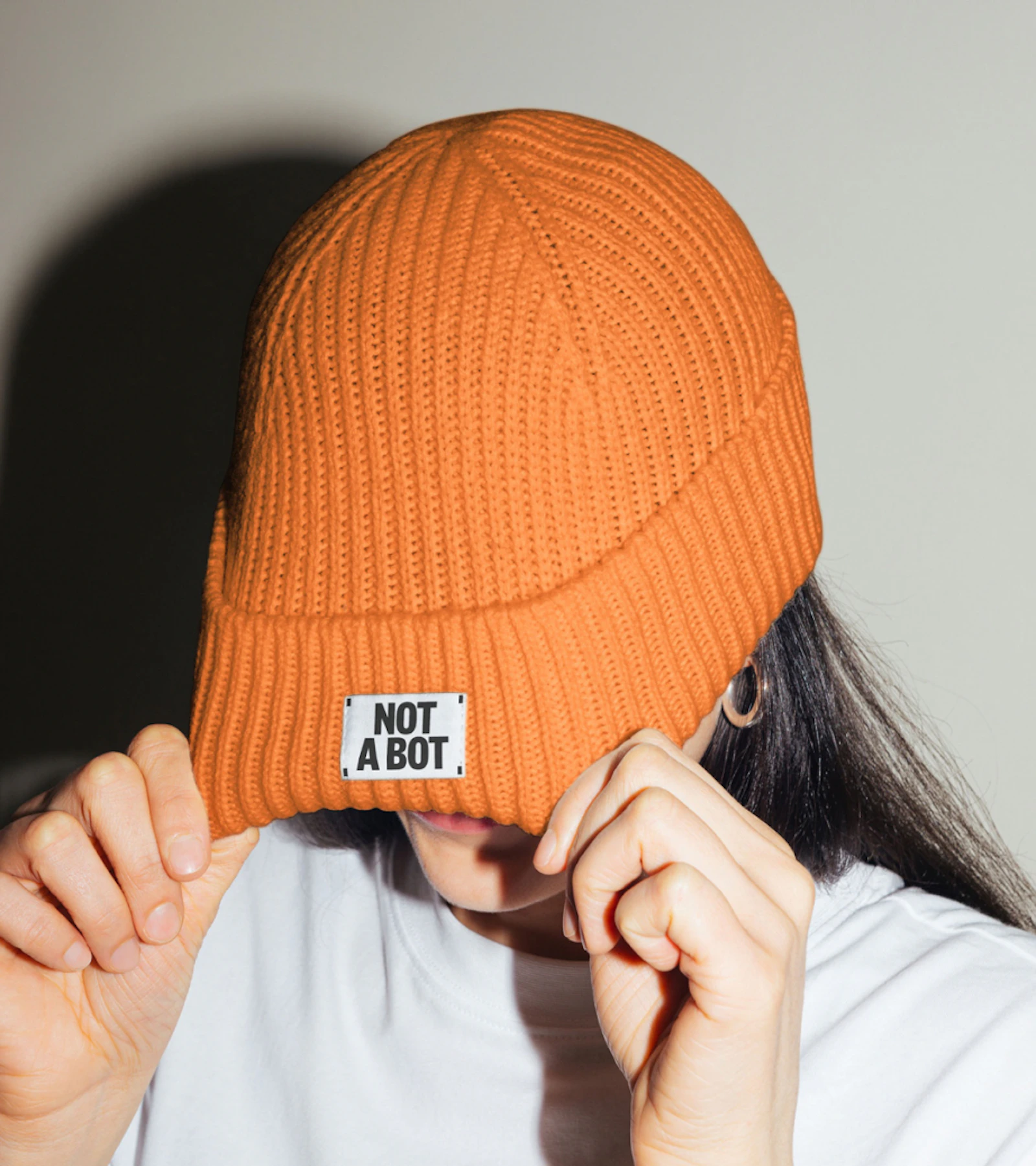 U Group's Branded Beanies: "NOT A BOT" Company Merch